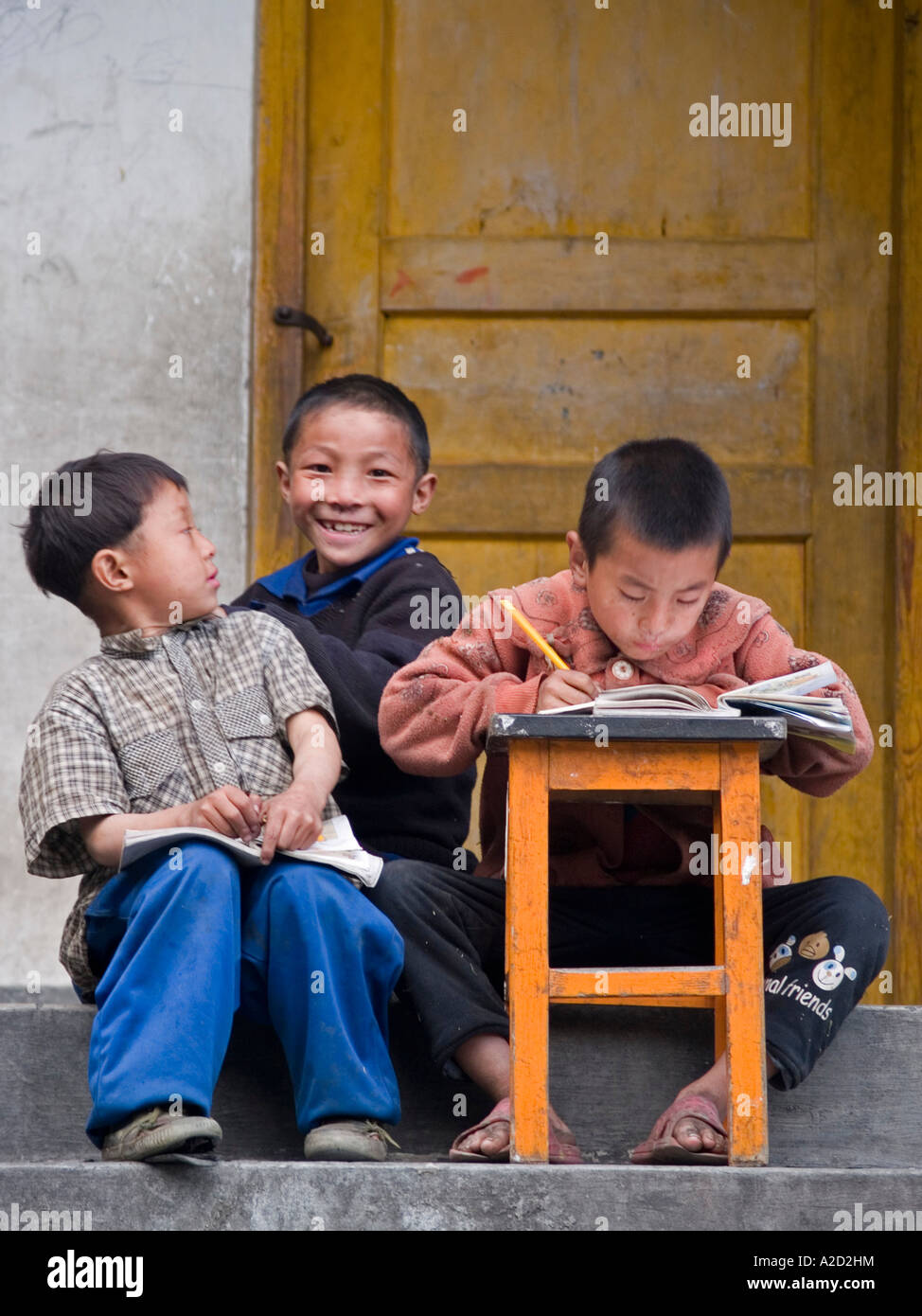 schoolboys in the Nujiang Valley Yunnan China Stock Photo - Alamy