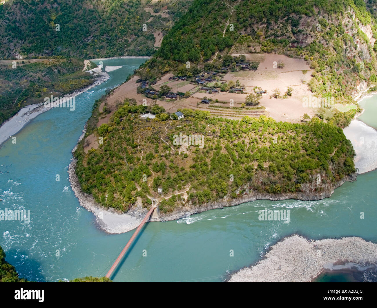 a sweeping bend in the Nujiang River with Plum Blossom Island and its ...