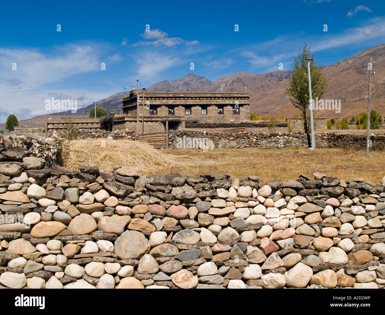traditional Tibetan houses and stone walls Daocheng China Stock Photo ...
