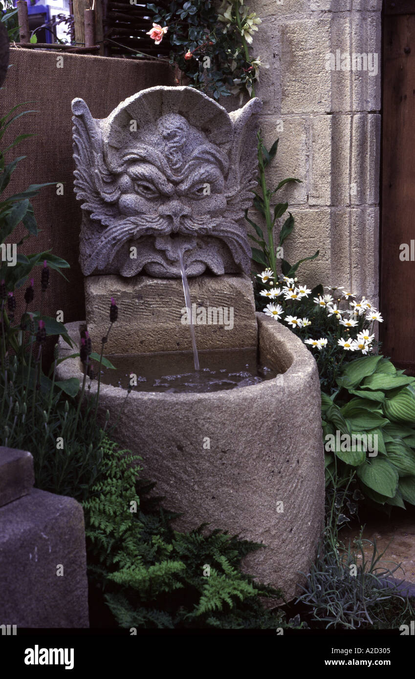 Gothic Style Head fountain into stone water trough Chelsea Flower Show ...