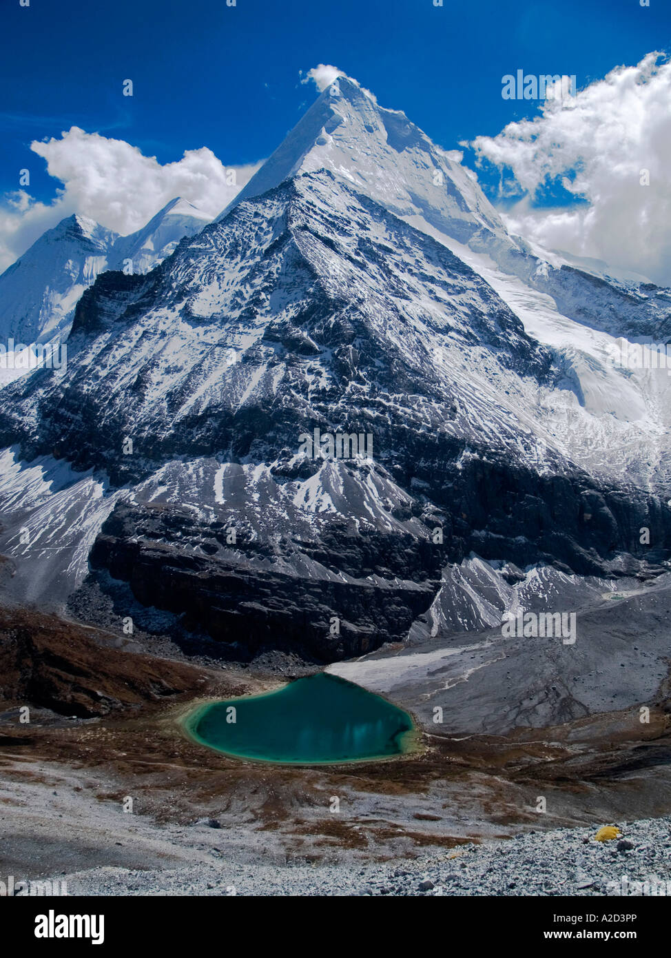 Yanmaiyang peak and glacial lake Yading National Park China Stock Photo ...