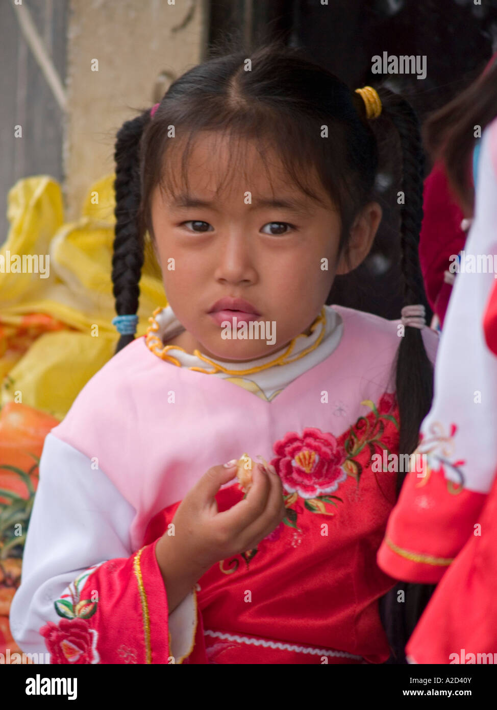 Bai girl in red Dali China Stock Photo - Alamy