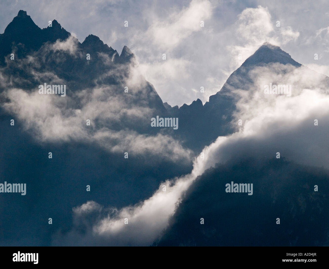 clouds rushing in Jade Dragon Snow Mountains Yunnan China Stock Photo ...