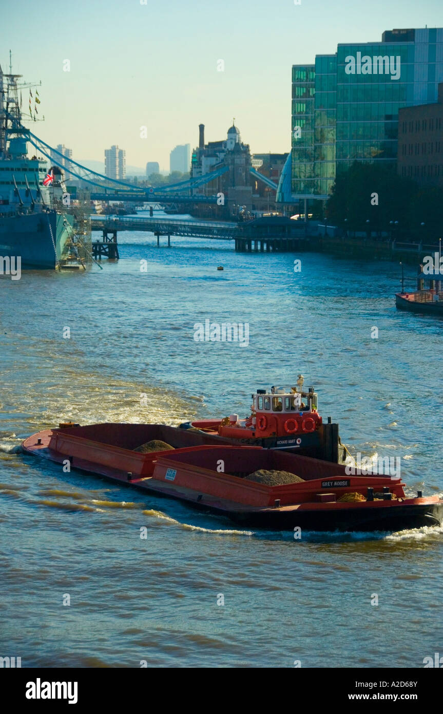 Barge being towed upstream on the river Thames Stock Photo - Alamy