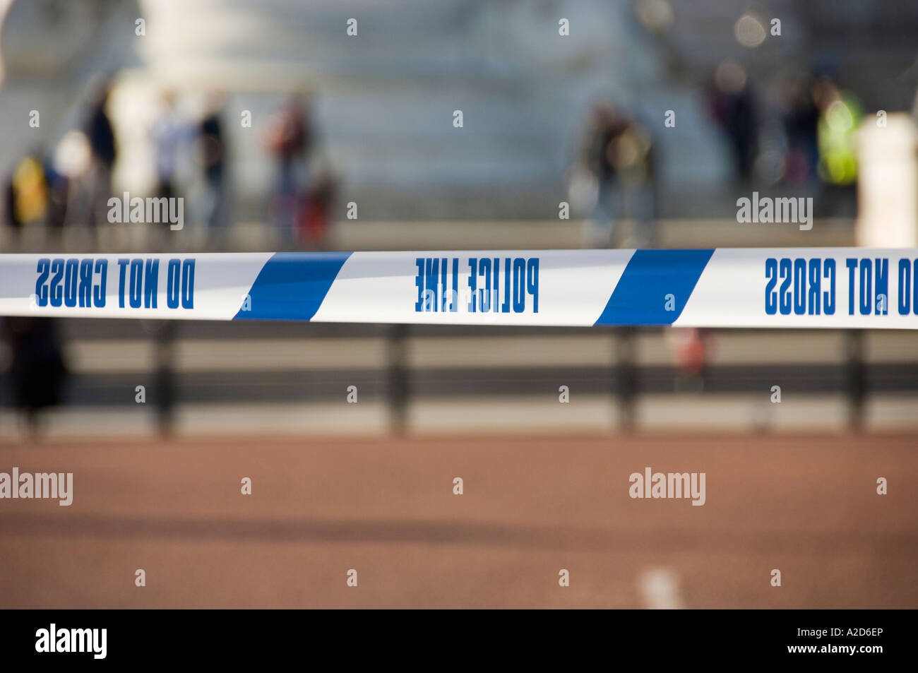 Police line barrier do not cross viewed from behind barrier Stock Photo ...