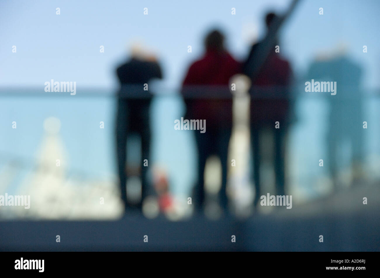 Three blurred figures Stock Photo - Alamy