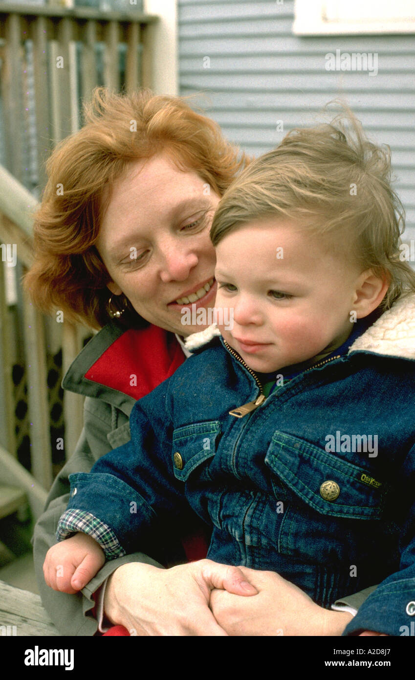 Mom holding son on lap age 40 and 3. Minneapolis Minnesota USA Stock ...