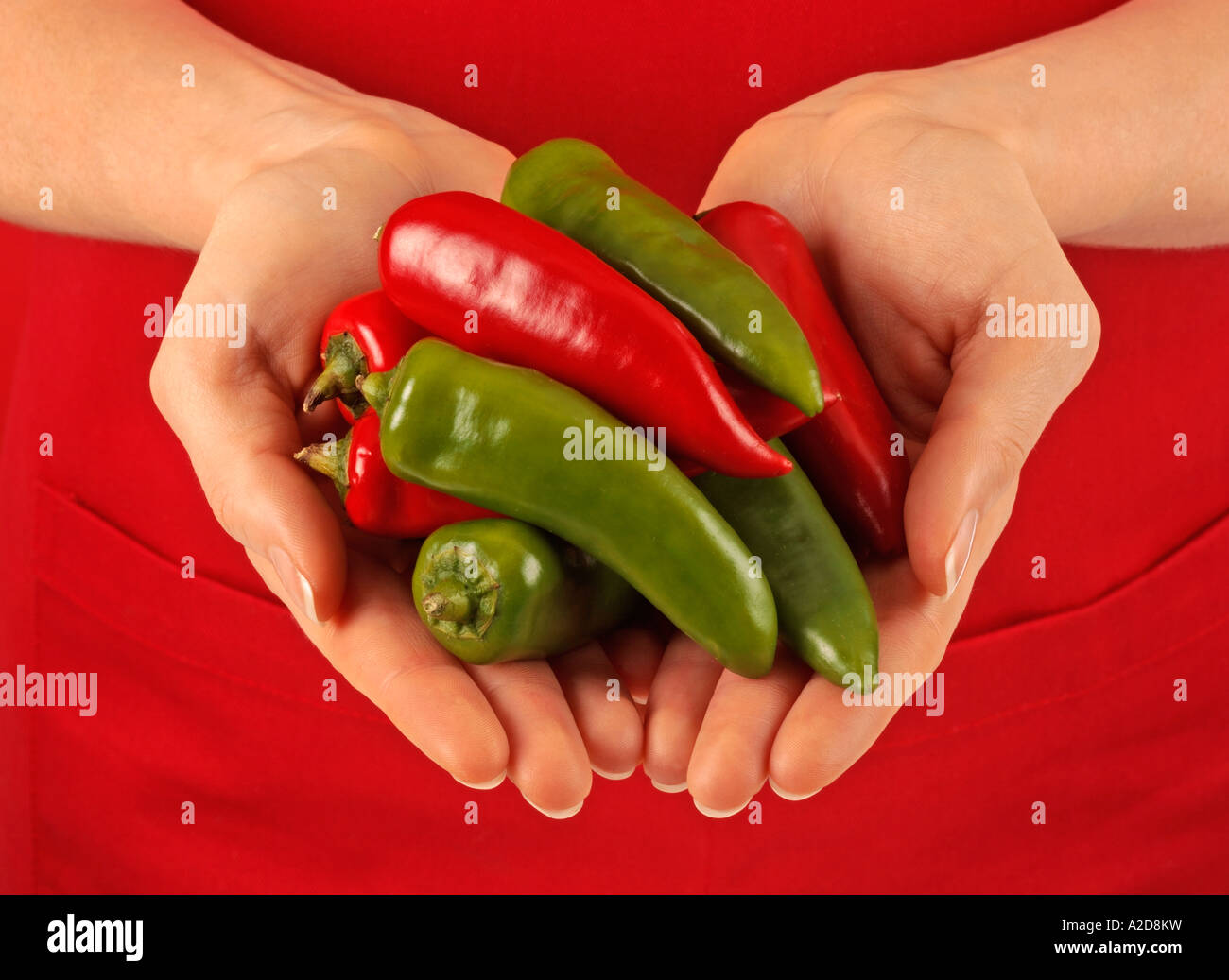 Girl with chillies hi-res stock photography and images - Alamy