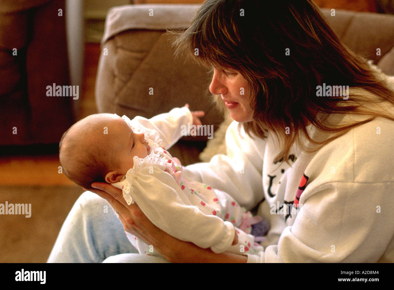 New born babies with mums hi-res stock photography and images - Alamy