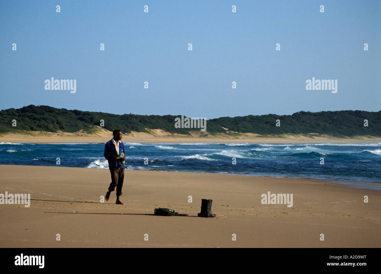 Fisherman fishing on the beach at Rocktail Bay Maputaland Kwazulu Natal ...