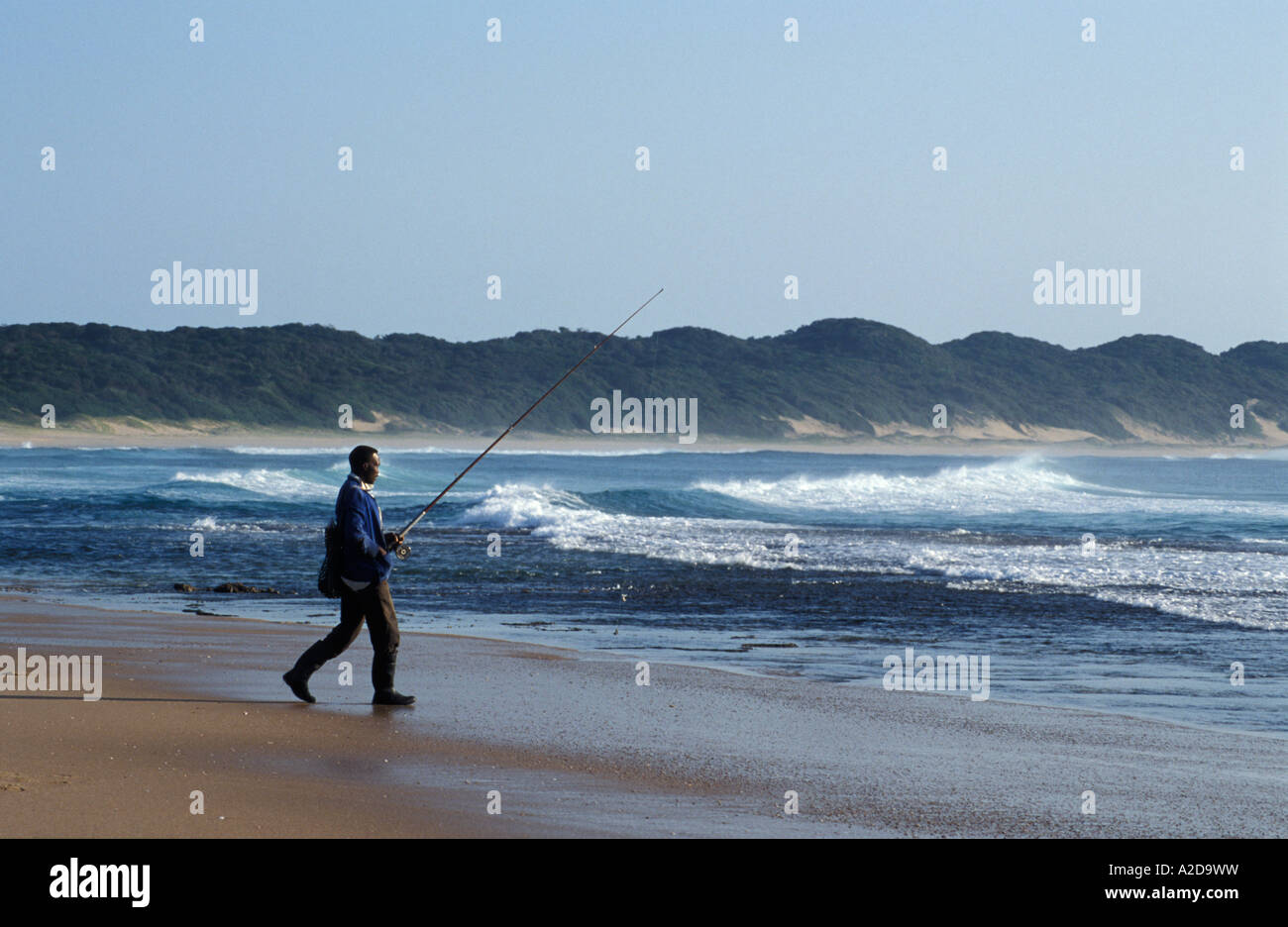 Fisherman fishing on the beach at Rocktail Bay Maputaland Kwazulu Natal ...