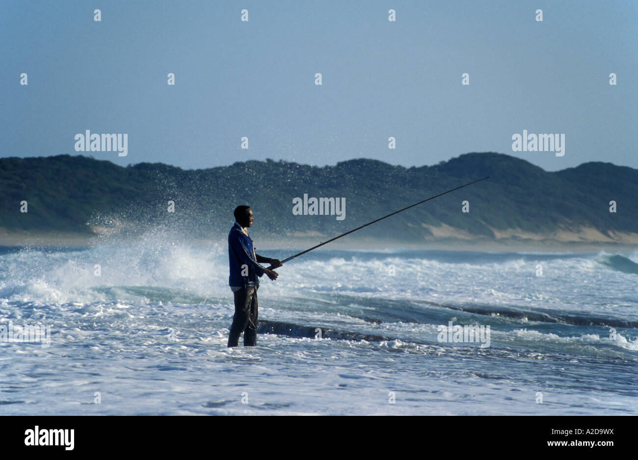 Fisherman fishing on the beach at Rocktail Bay Maputaland Kwazulu Natal ...