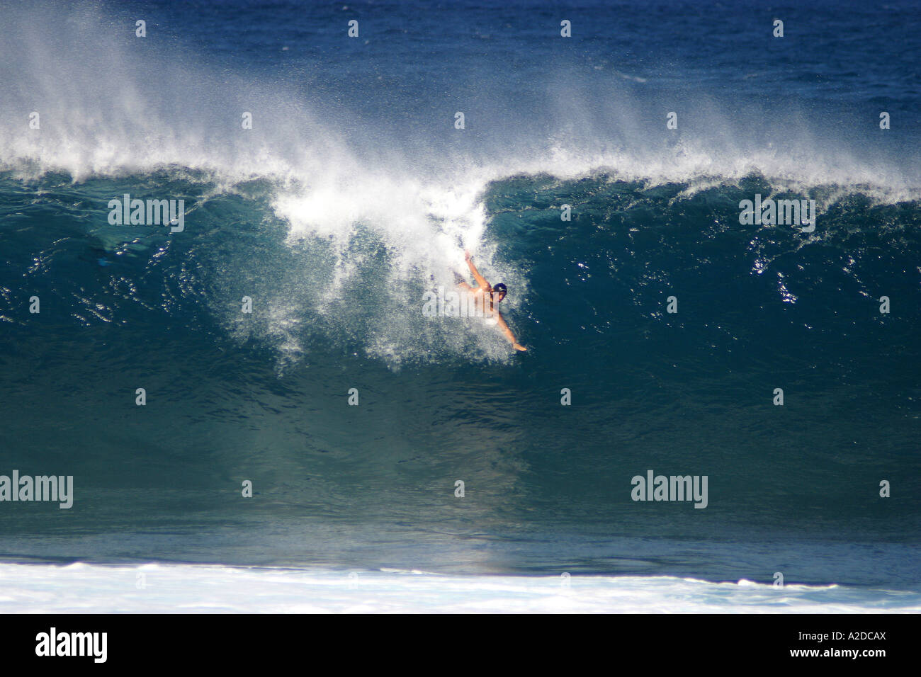 Body surfer competing in The "Classic" at Pipeline, North Shore, Oahu ...
