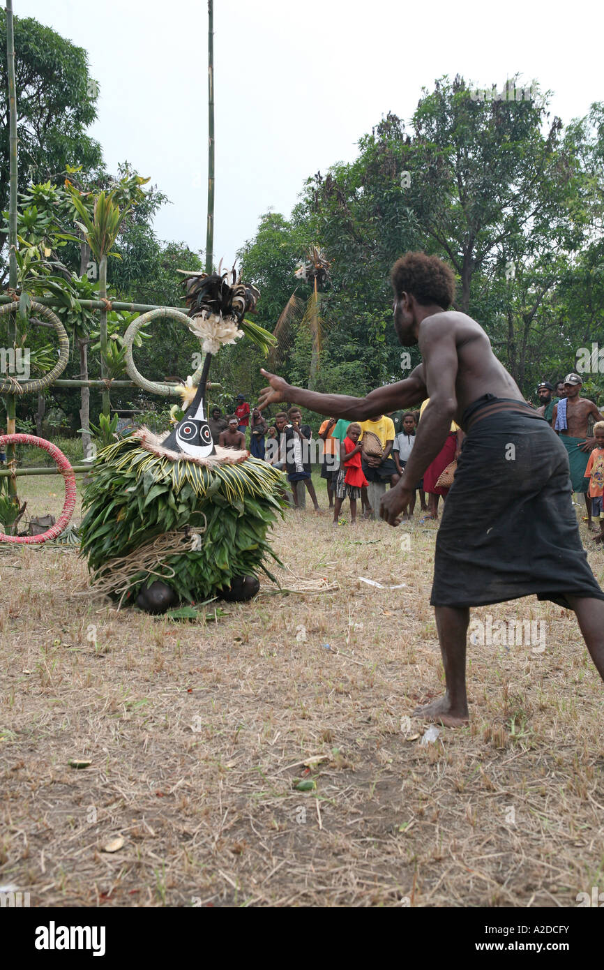 Men throw shell money at Tubuans at a Tolai Death Ceremony, Matupit ... Men throw shell money at Tubuans at a Tolai Death Ceremony, Matupit ...