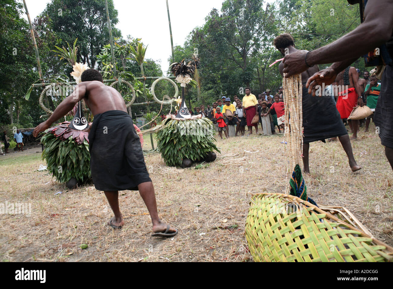Men throw shell money at Tubuans at a Tolai Death Ceremony, Matupit ... Men throw shell money at Tubuans at a Tolai Death Ceremony, Matupit ...