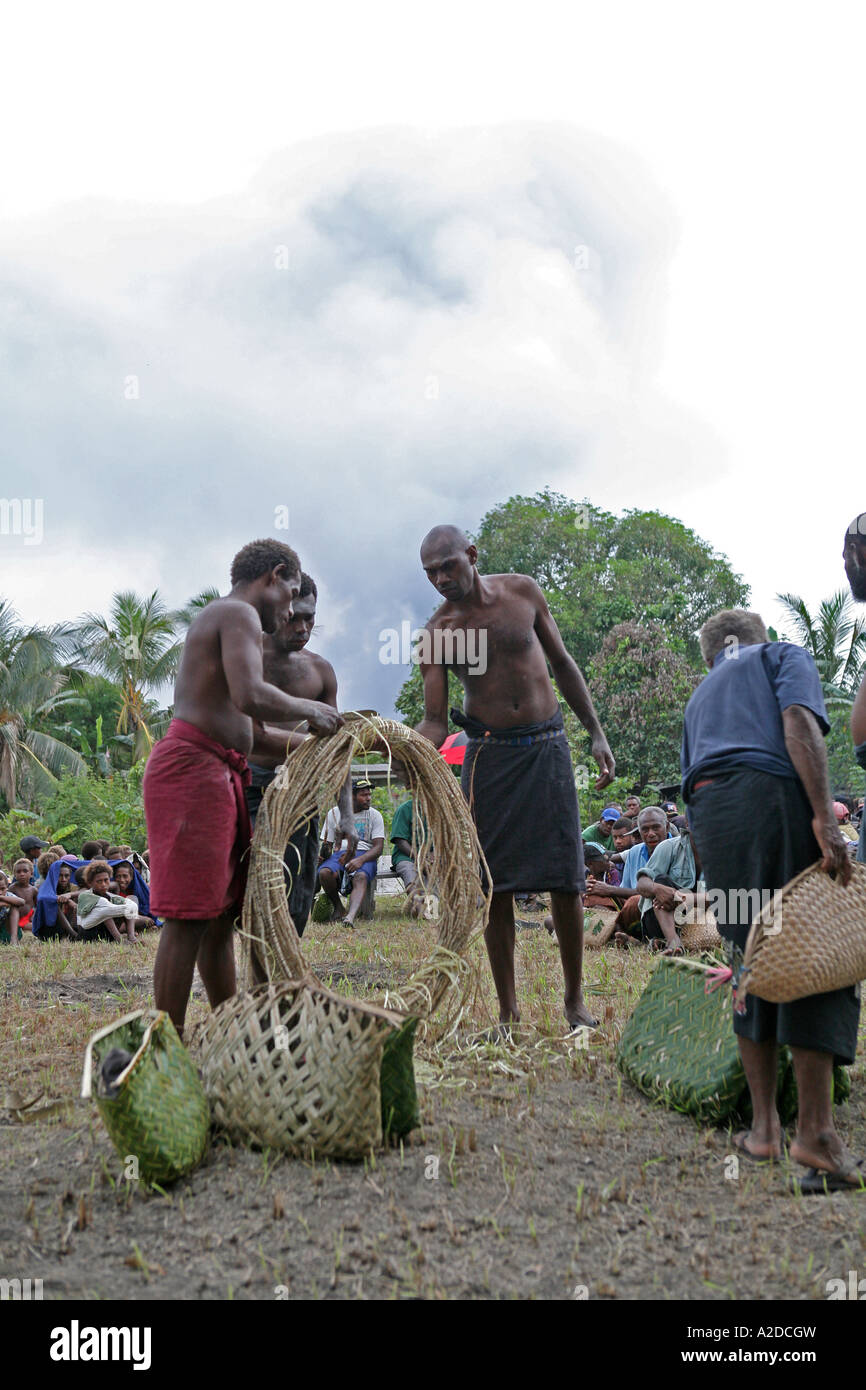 Tolai men distributing shell money for use in a Tolai Death Ceremony ... Tolai men distributing shell money for use in a Tolai Death Ceremony ...