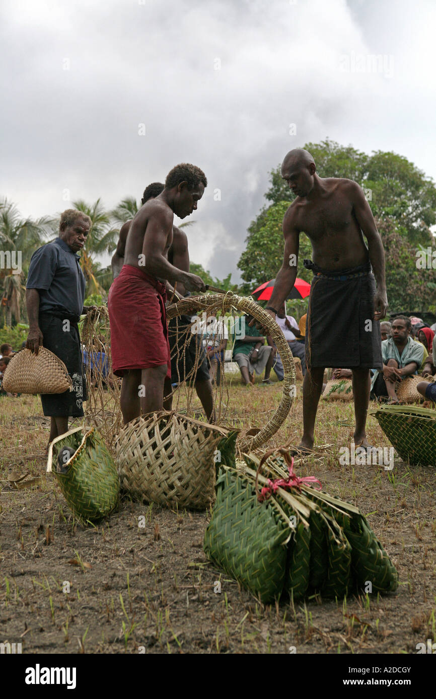 Tolai men distributing shell money for use in a Tolai Death Ceremony ... Tolai men distributing shell money for use in a Tolai Death Ceremony ...