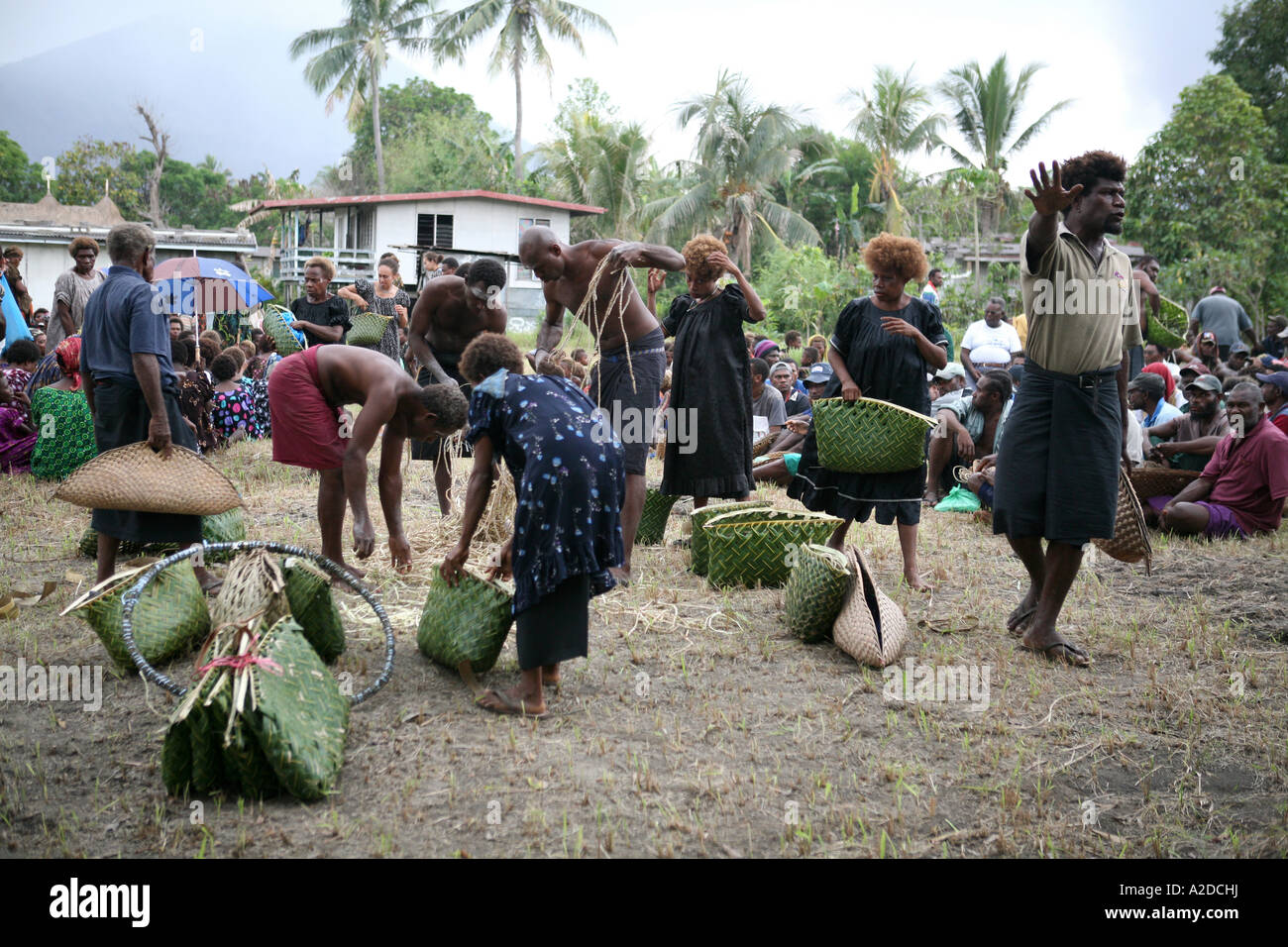 Tolai men distributing shell money for use in a Tolai Death Ceremony ... Tolai men distributing shell money for use in a Tolai Death Ceremony ...