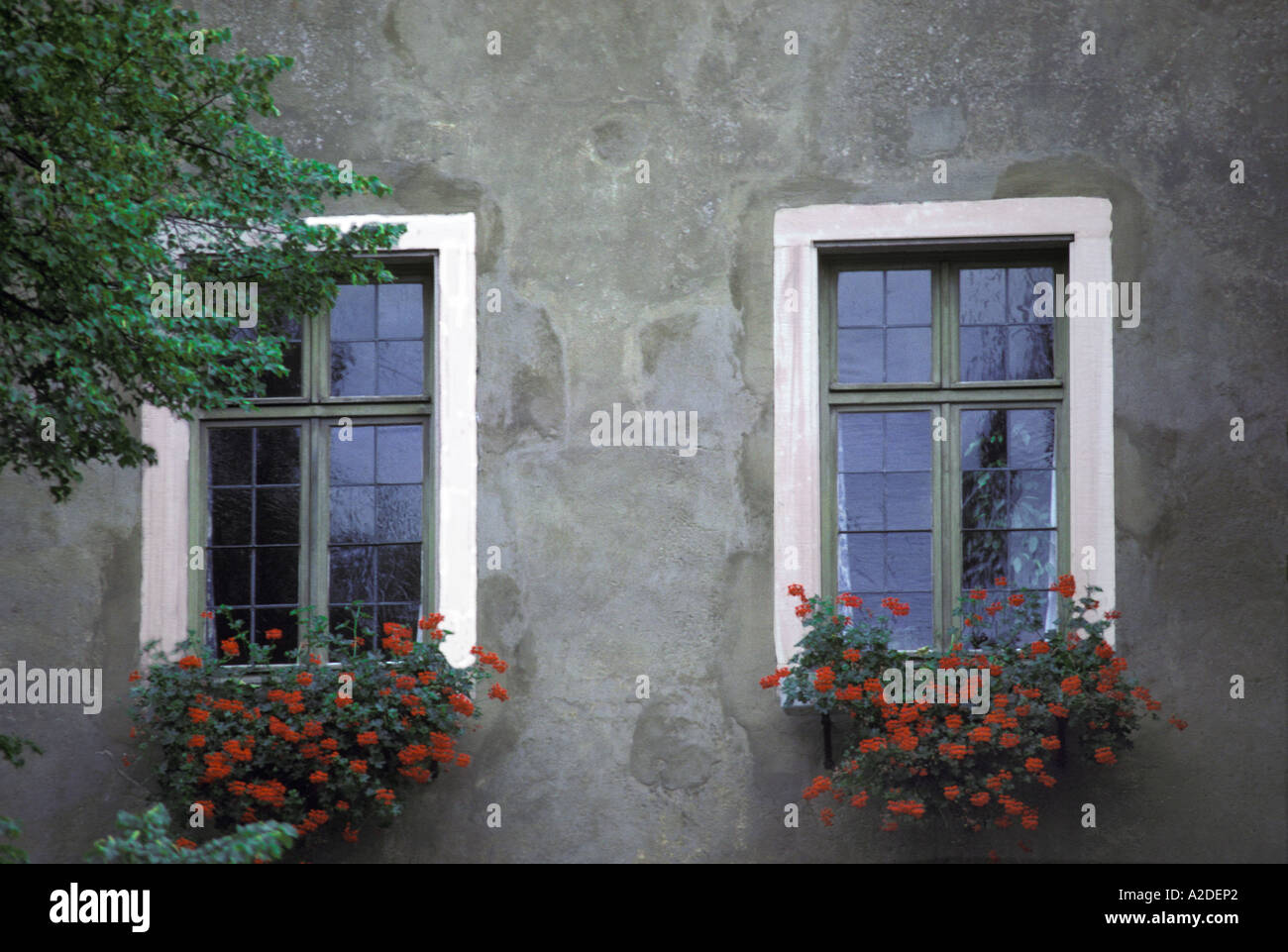 European window boxes in red - simple elegant living Stock Photo - Alamy