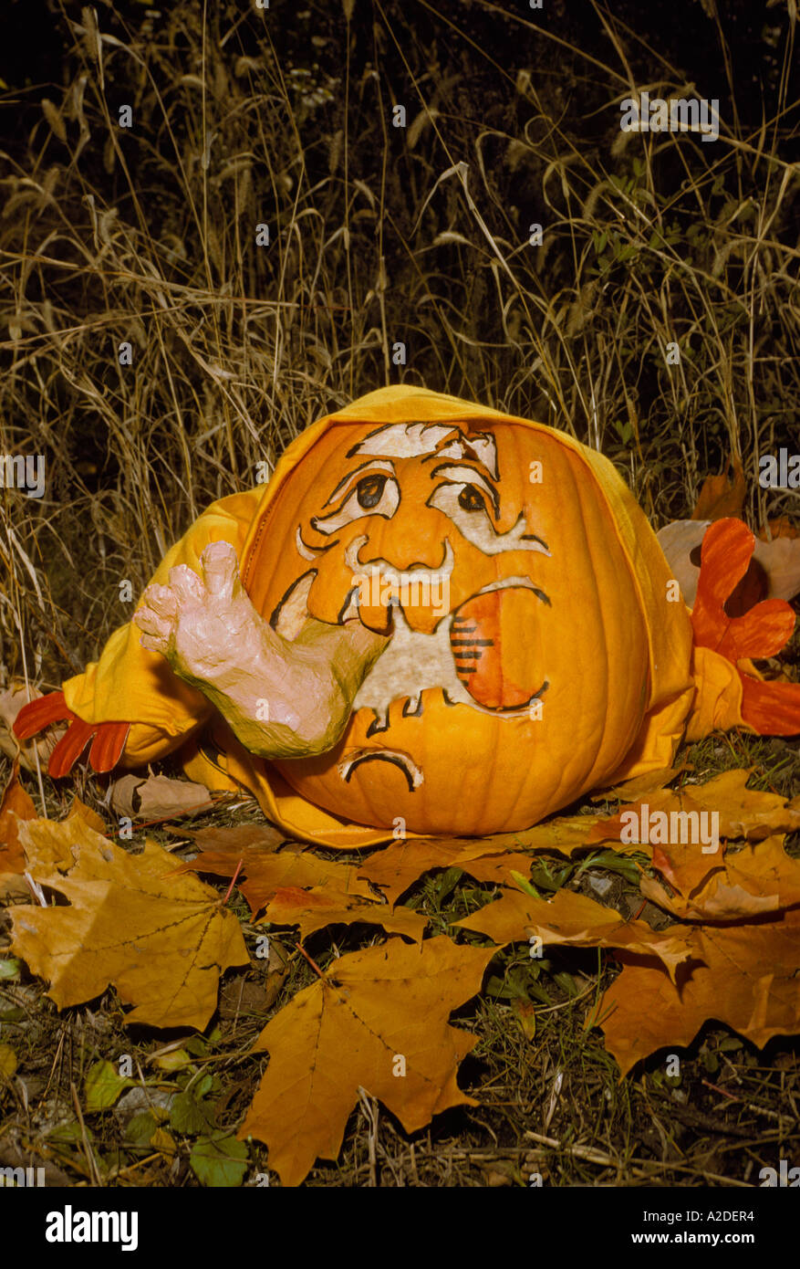 Vicious pumpkin with unfortunate victims foot protruding from mouth ...