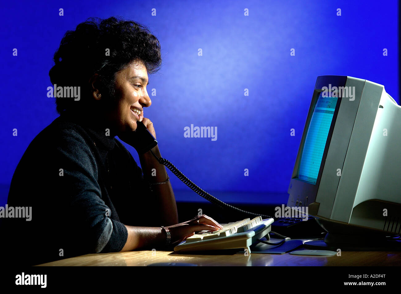 women at computer Stock Photo - Alamy