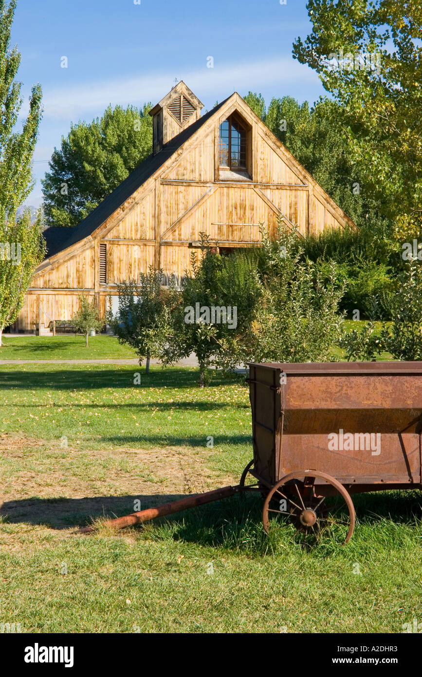 Farm wagon standing in front of a barn at Wheeler Farm Historical Park ...