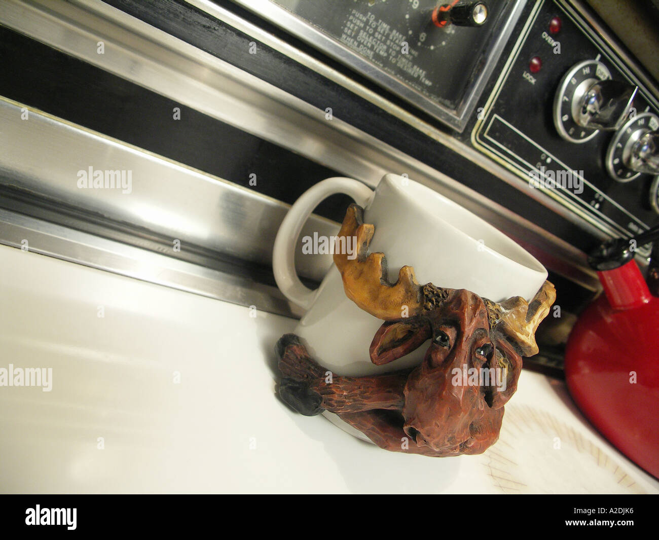 Carved Moose Head on Coffee Cup Stock Photo - Alamy