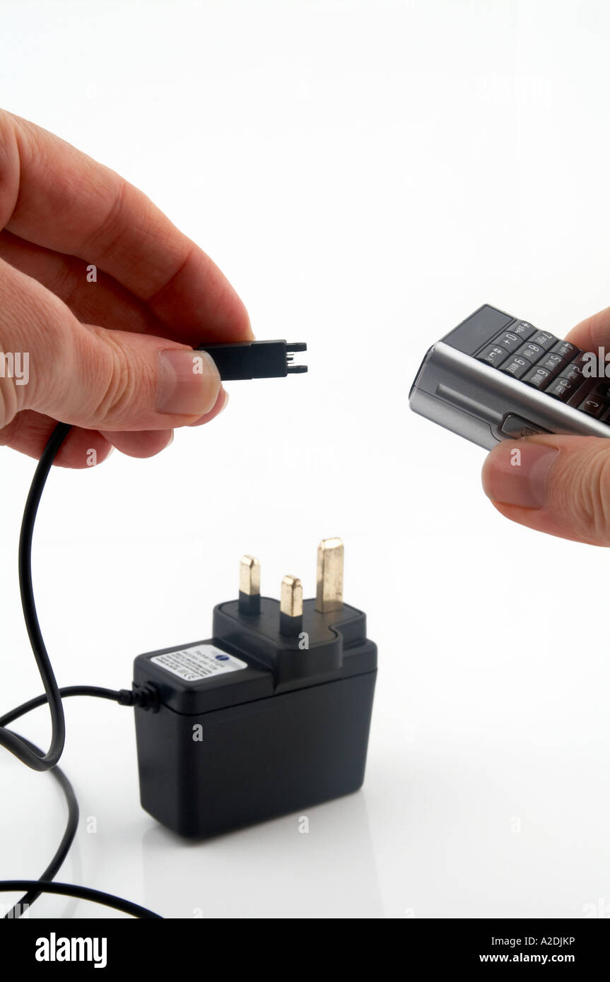 mobile phone with charger Stock Photo - Alamy