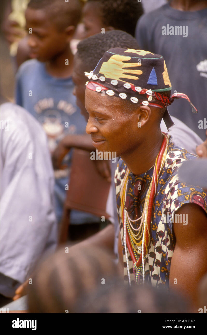Smiling african man in a crowd , Ouidah Stock Photo - Alamy