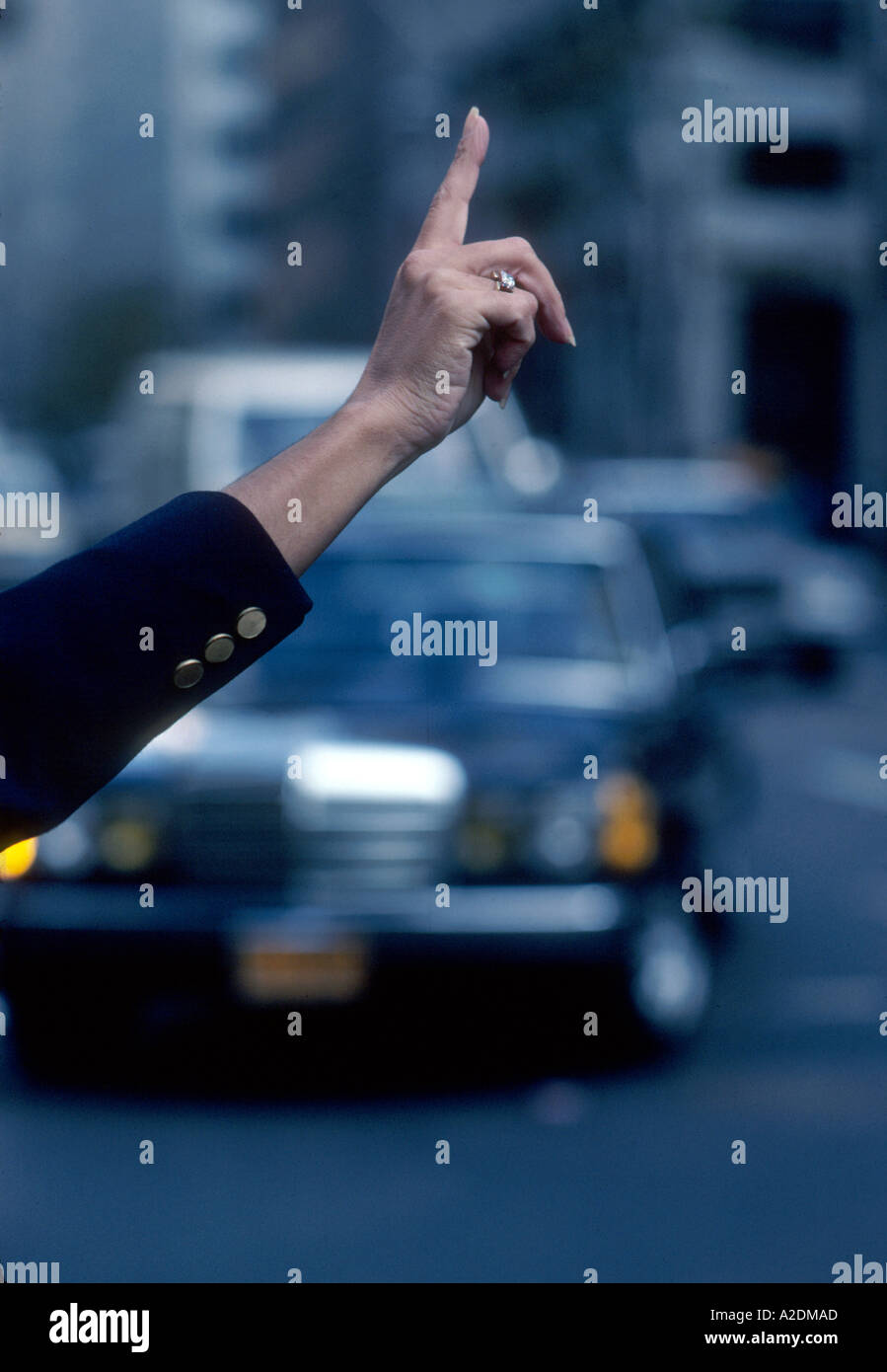 Woman hailing cab new york hi-res stock photography and images - Alamy