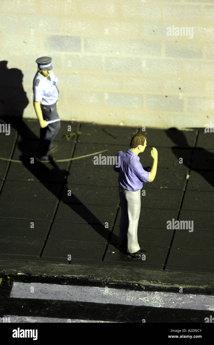 vertical colour color model village figure tiny small man policeman ...