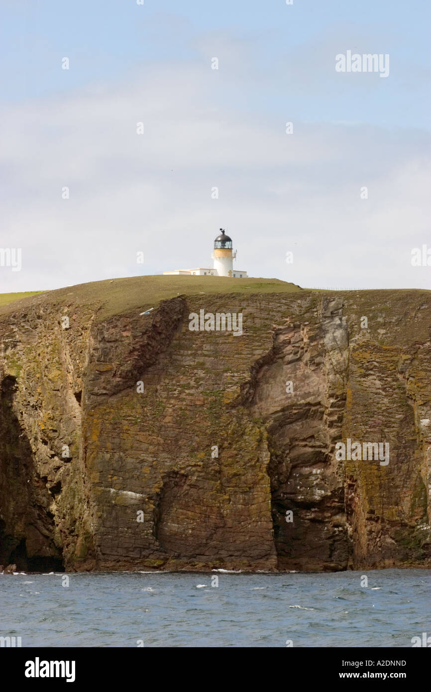 Lighthouse on a cliff Stock Photo - Alamy