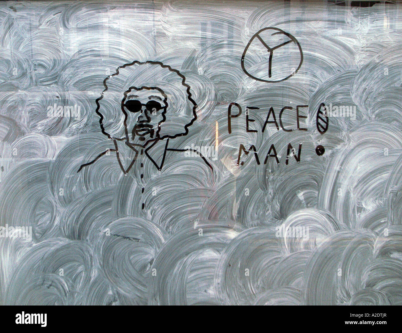 PEACE MAN SIGN IN WINDOW OF CLOSED SUE RYDER CHARITY SHOP SAFFRON ...