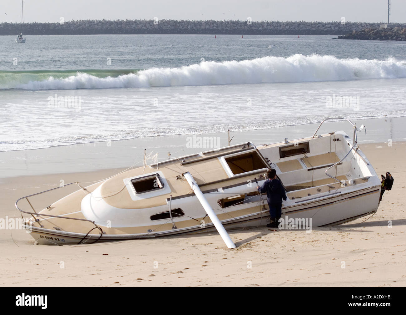 Boat wreckage on after recent series of extremely large waves Stock ...