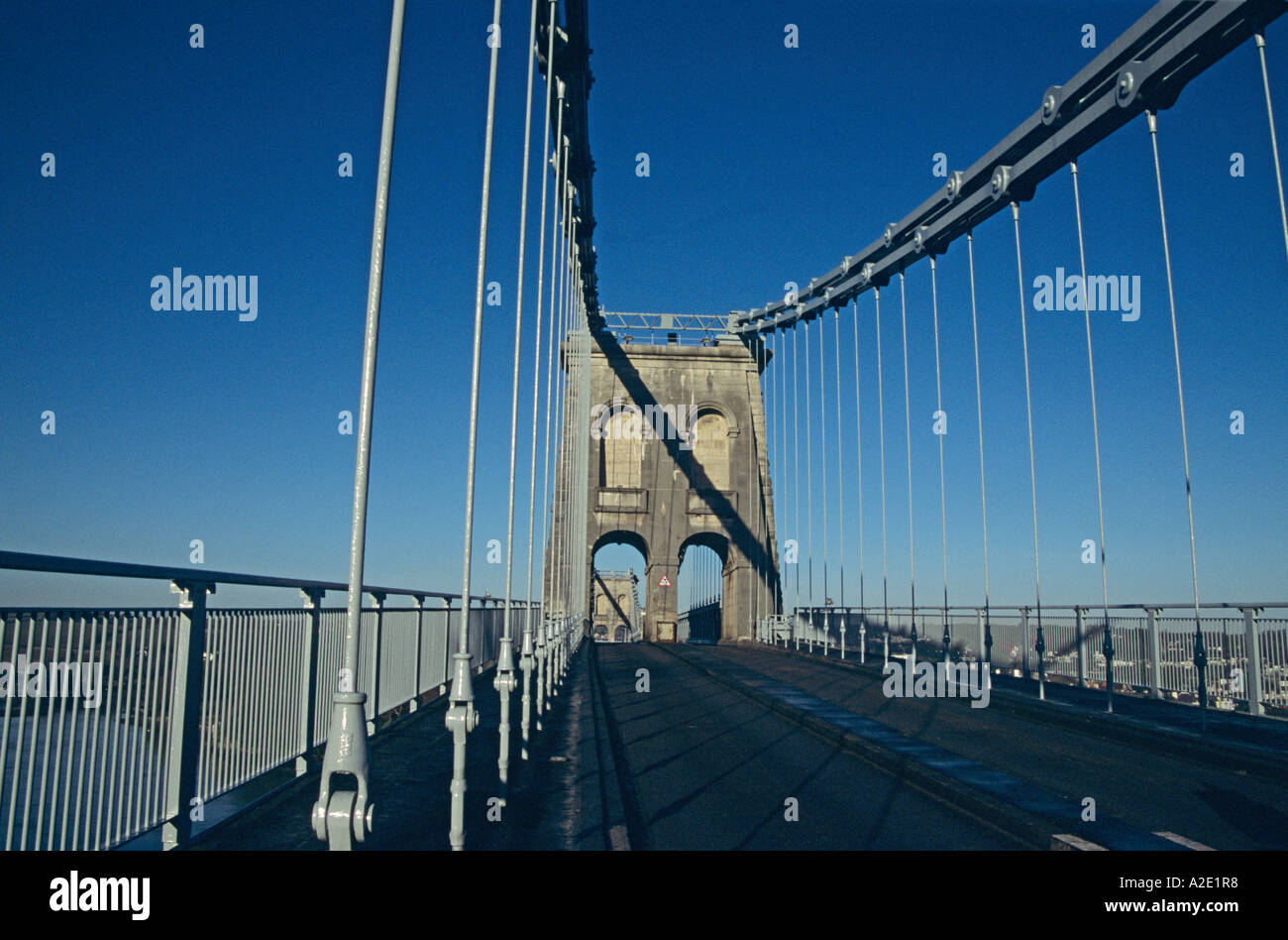 MENAI BRIDGE ISLE OF ANGLESEY UK January Looking up to the supporting ...