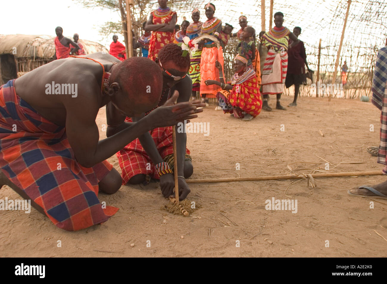Africa, Kenya, Samburu man building fire Stock Photo - Alamy