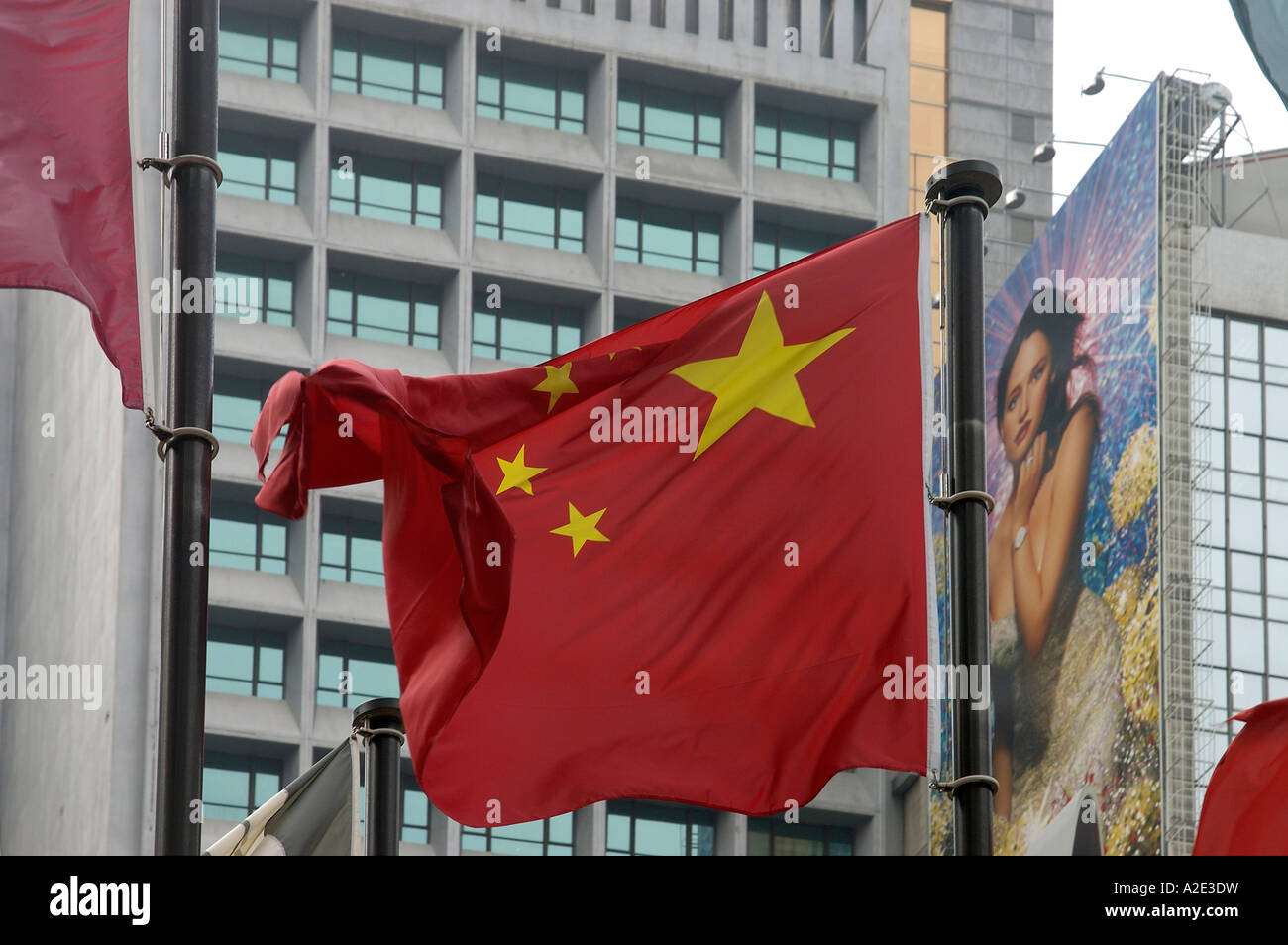 Chinese Flag flying over Hong Kong Stock Photo - Alamy
