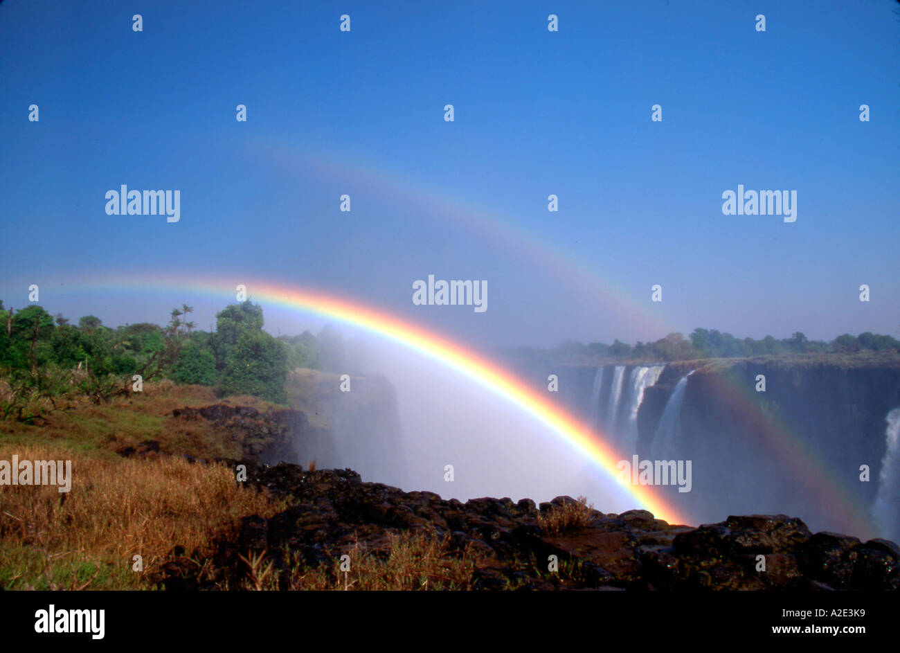 Zimbabwe, Victoria Falls National Park. Double rainbow over Victoria ...