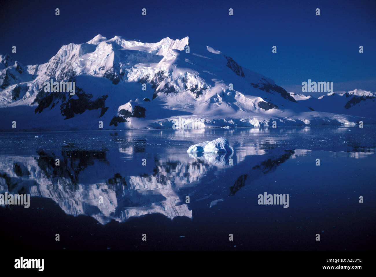 Antarctica. Reflection of mountain and glacier Stock Photo - Alamy