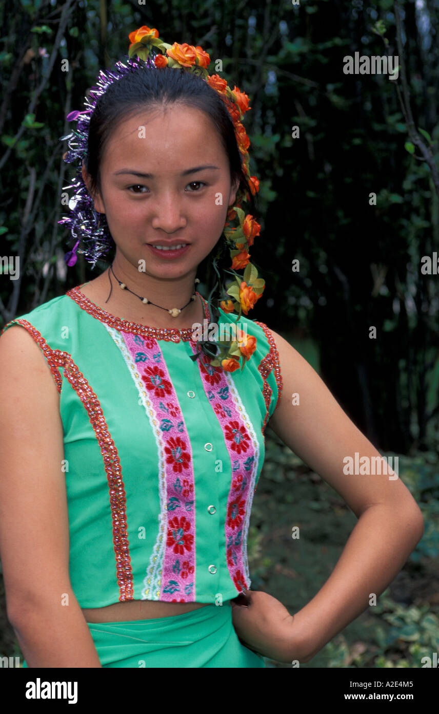 China, Yunnan Province, Kunming. Young Water Dai woman in traditional ...