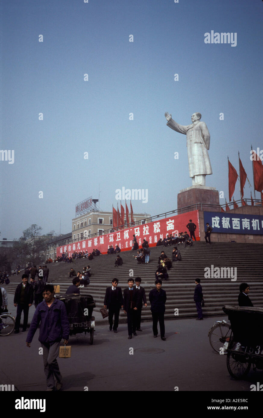 China, Large Mao Tsedong statue, communist flags, charachter banners ...
