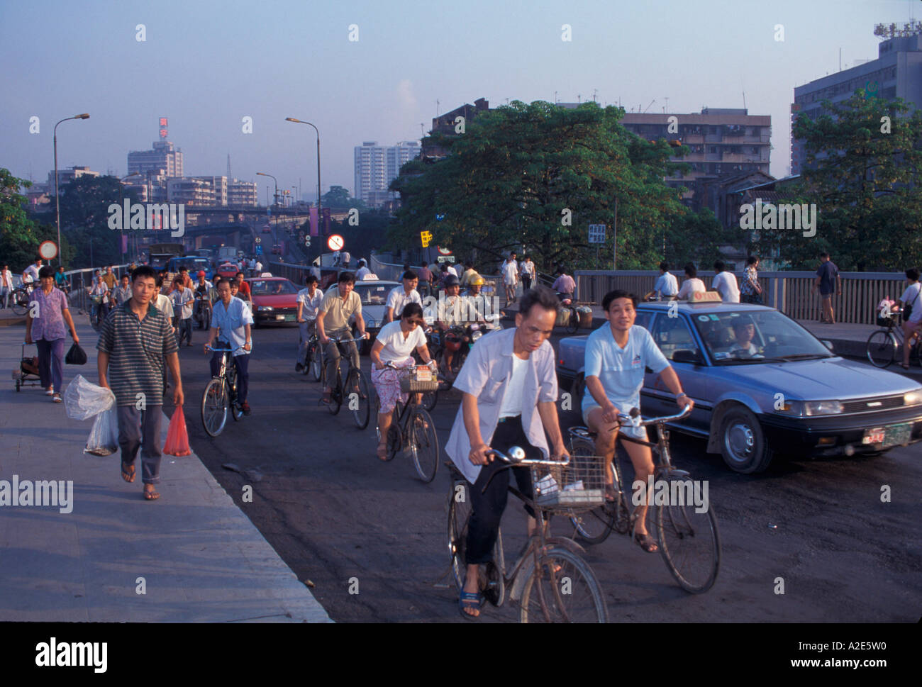Chinese commuter traffic on Renmin (People's) Bridge over Pearl River ...