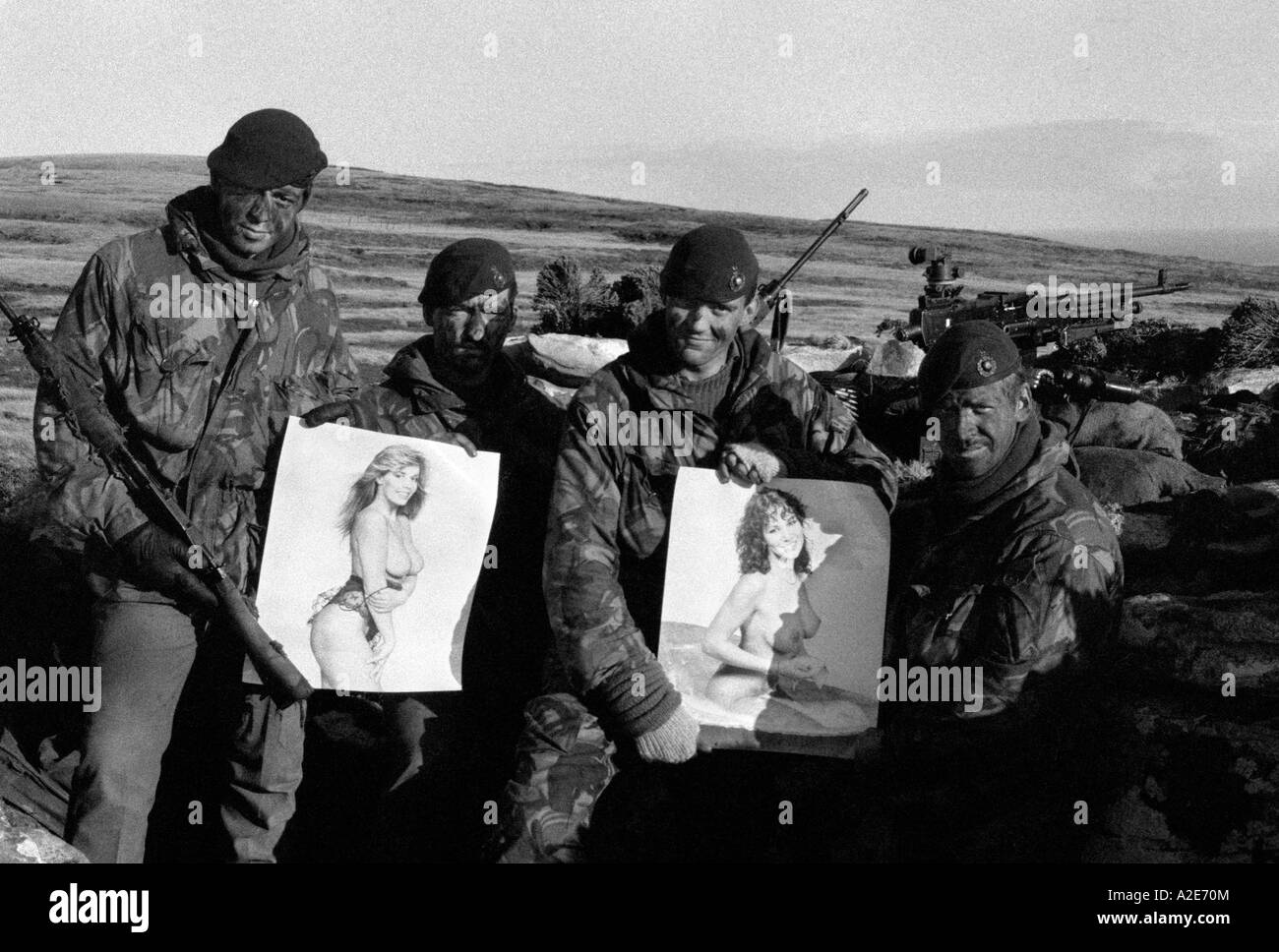 Royal Marines Commandos show off posters, sent by the Sun Newspaper ...
