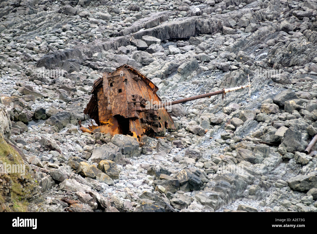 Rusty bow of a wrecked ship in the rocks Stock Photo - Alamy