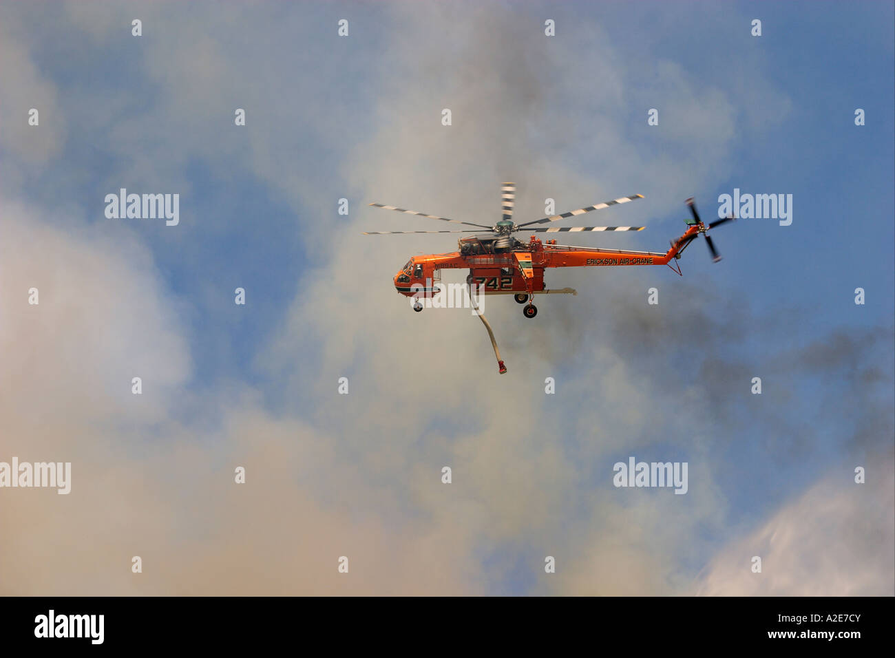 Sikorsky helicopter at a forest fire with smoke in the background Stock ...