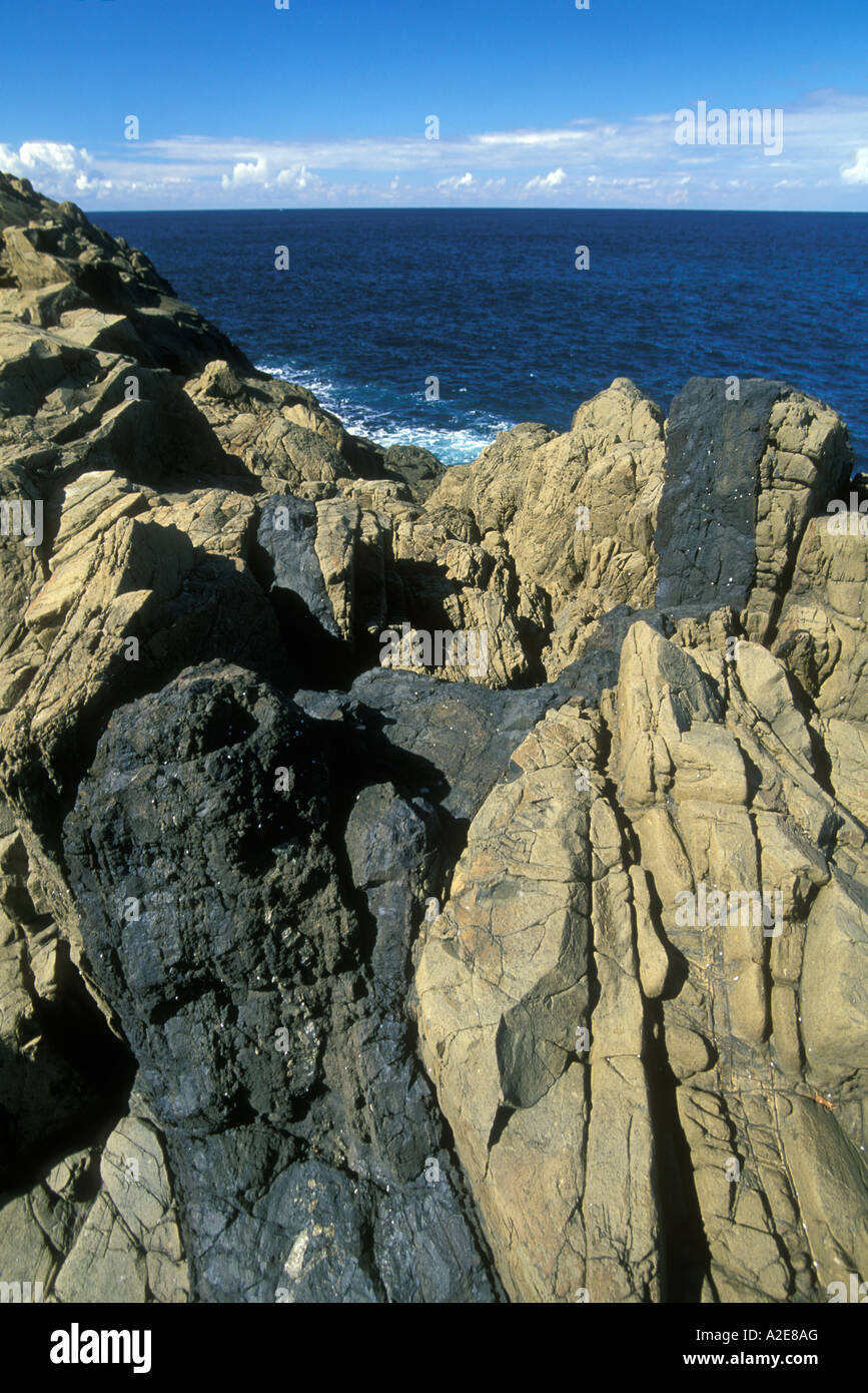 Permian era basalt lava with an intrusion or dyke of darker rock near ...