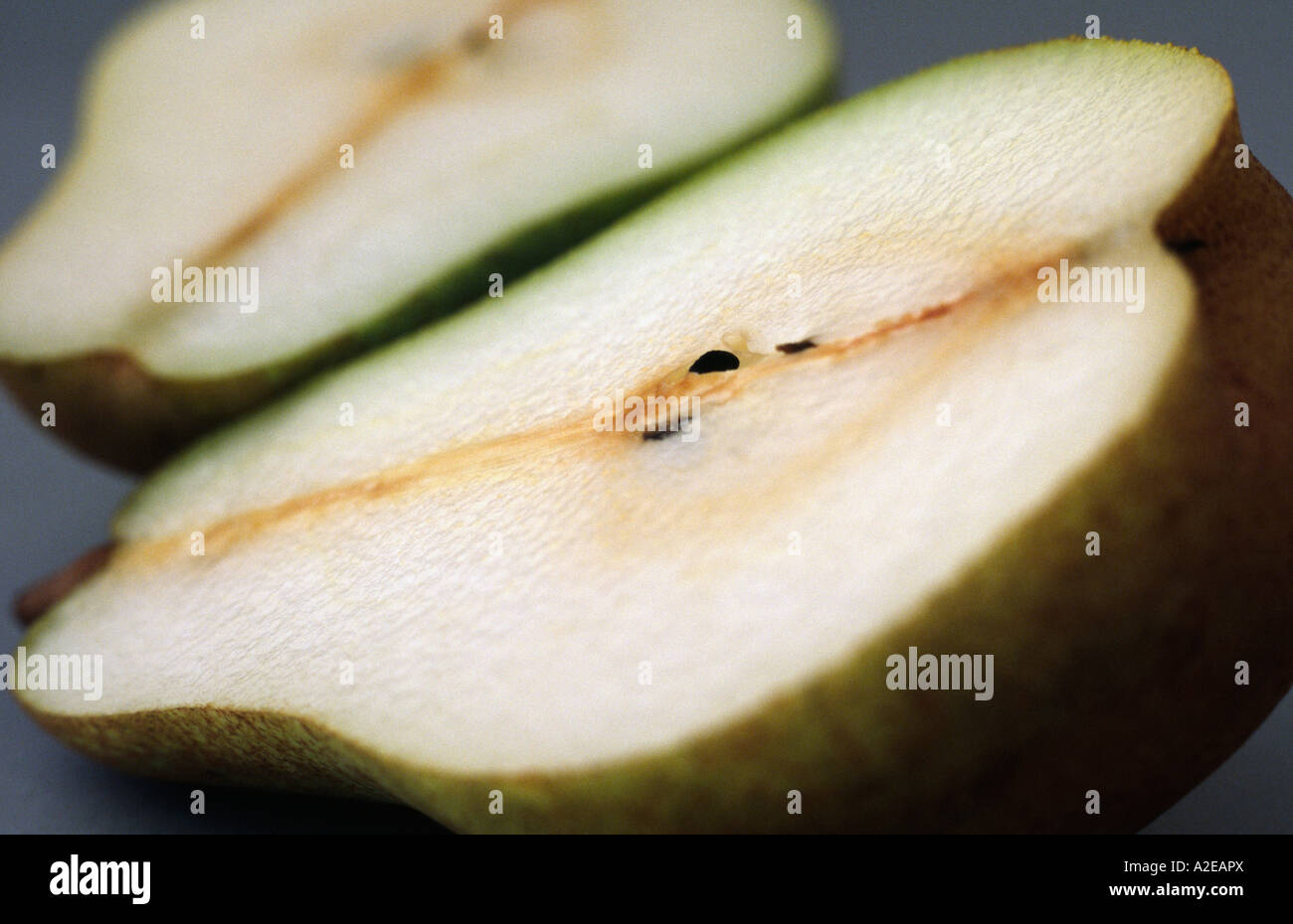 Pear in half Stock Photo - Alamy