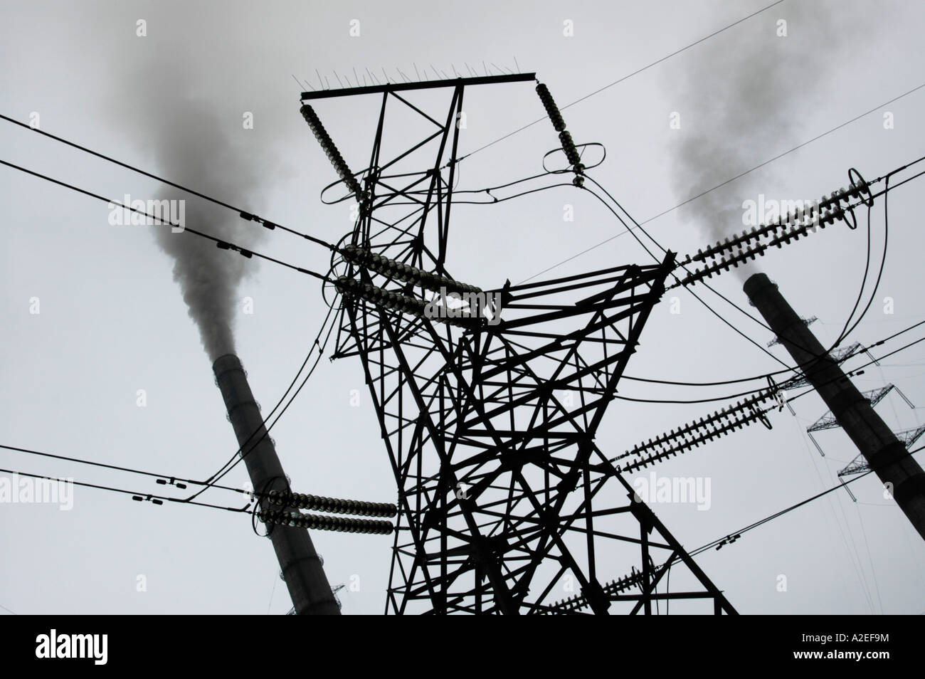smoke stacks high tension poles Stock Photo - Alamy