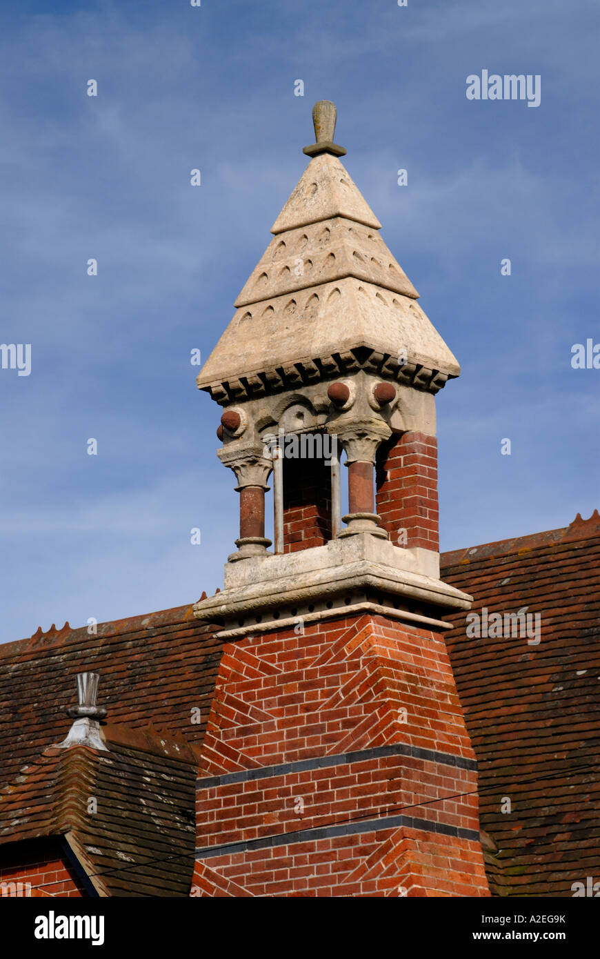 Ornate brick and stone bell tower of the now defunct Hawkhurst primary ...