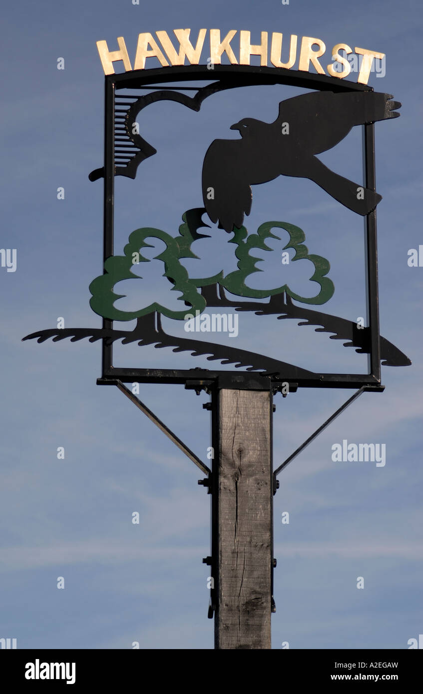 Wrought iron village sign of Hawkhurst showing a hawk and a wooded hill ...